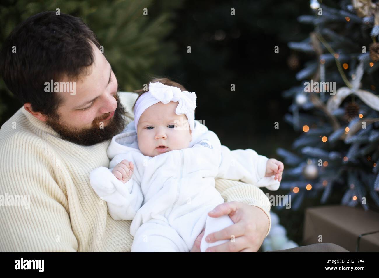 Portrait of european father and adorable baby daughter celebrating ...