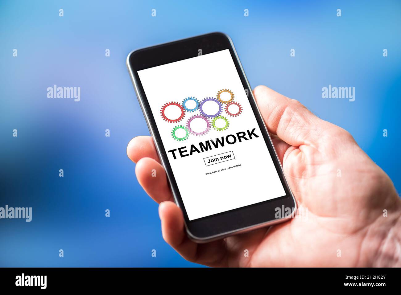 Smartphone screen displaying a teamwork concept Stock Photo - Alamy
