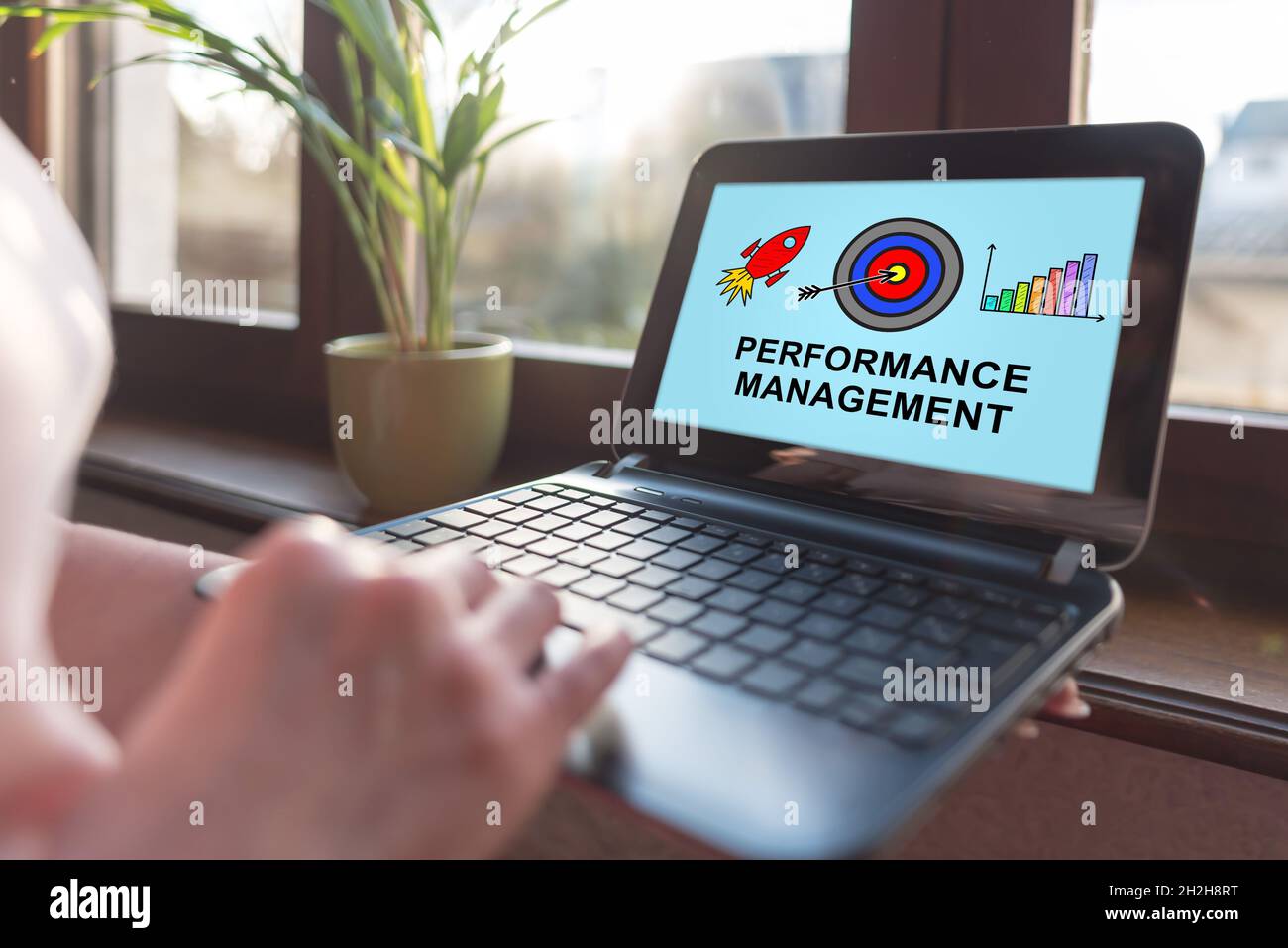 Laptop screen displaying a performance management concept Stock Photo ...