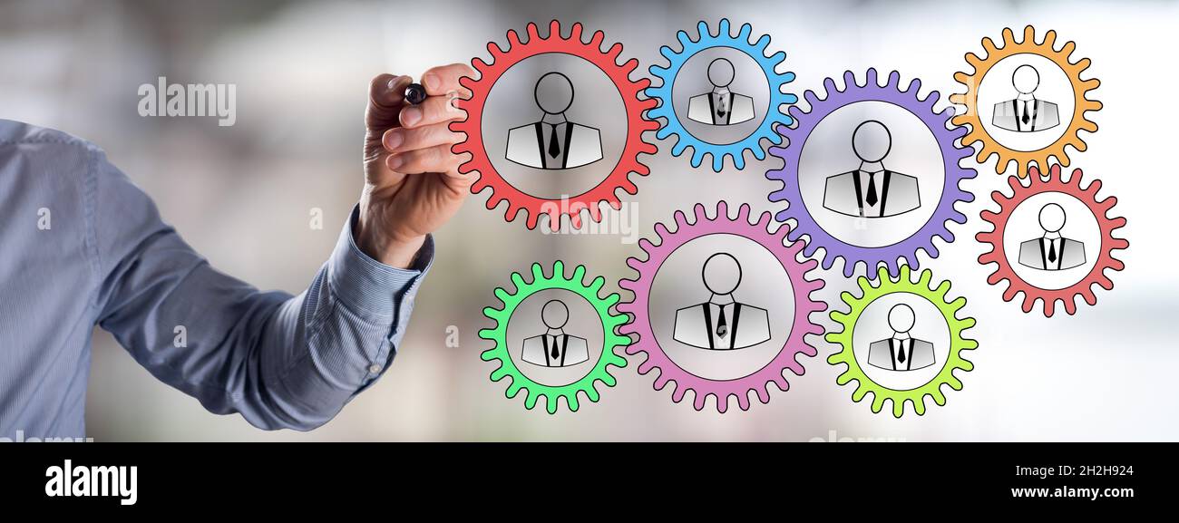 Man drawing a teamwork concept Stock Photo - Alamy