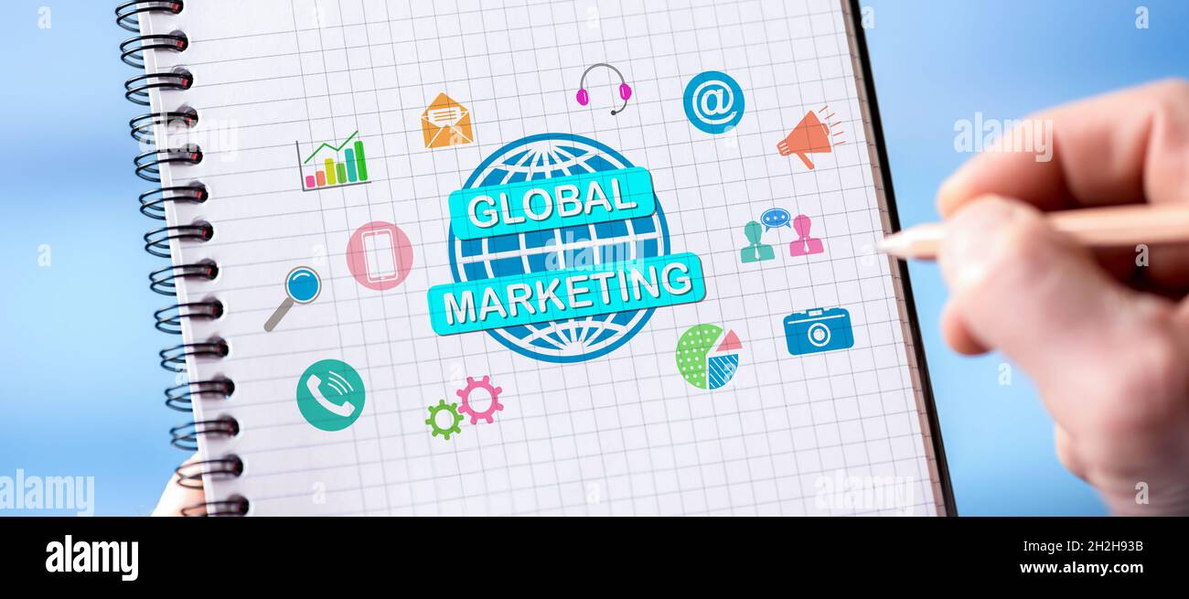 Hand drawing global marketing concept on a notepad Stock Photo - Alamy
