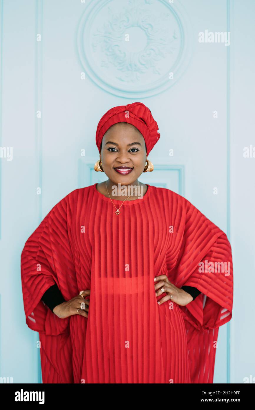 African fashion model in traditional african style with red stylish ...