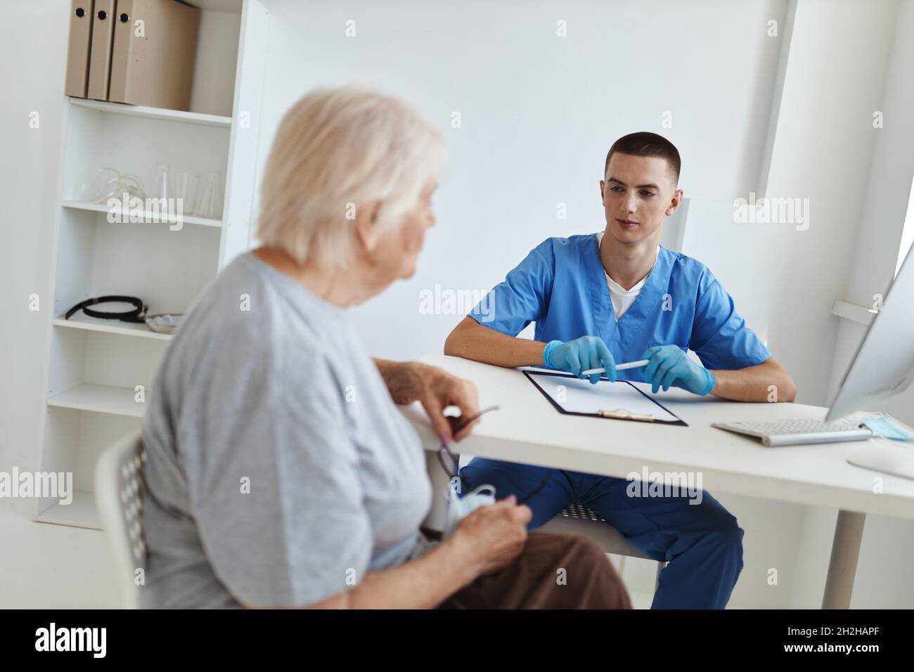 patient at the doctor's appointment health care Stock Photo - Alamy