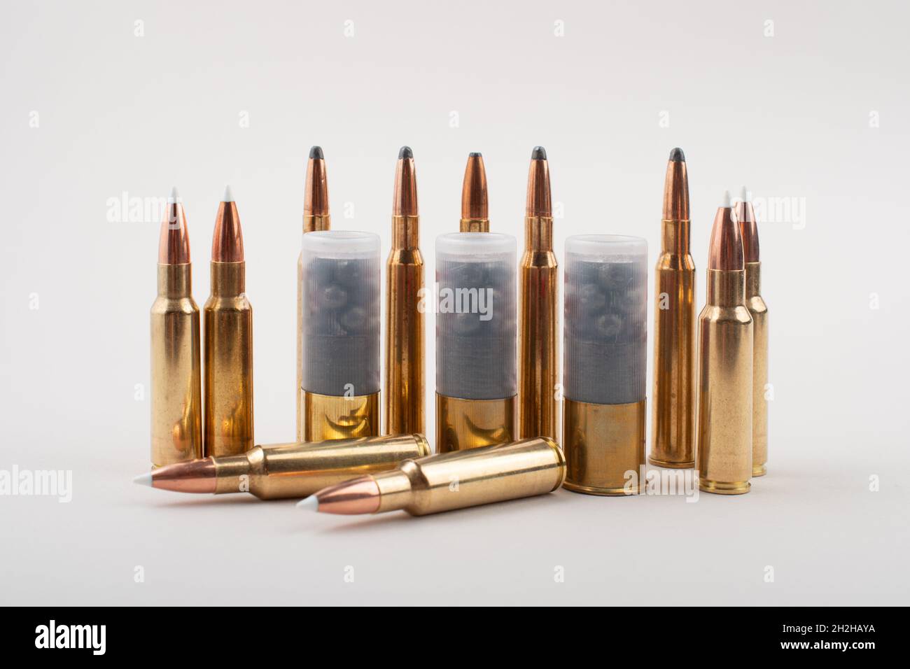 Diffrent type of rifle bullets isolated on grey background Stock Photo ...