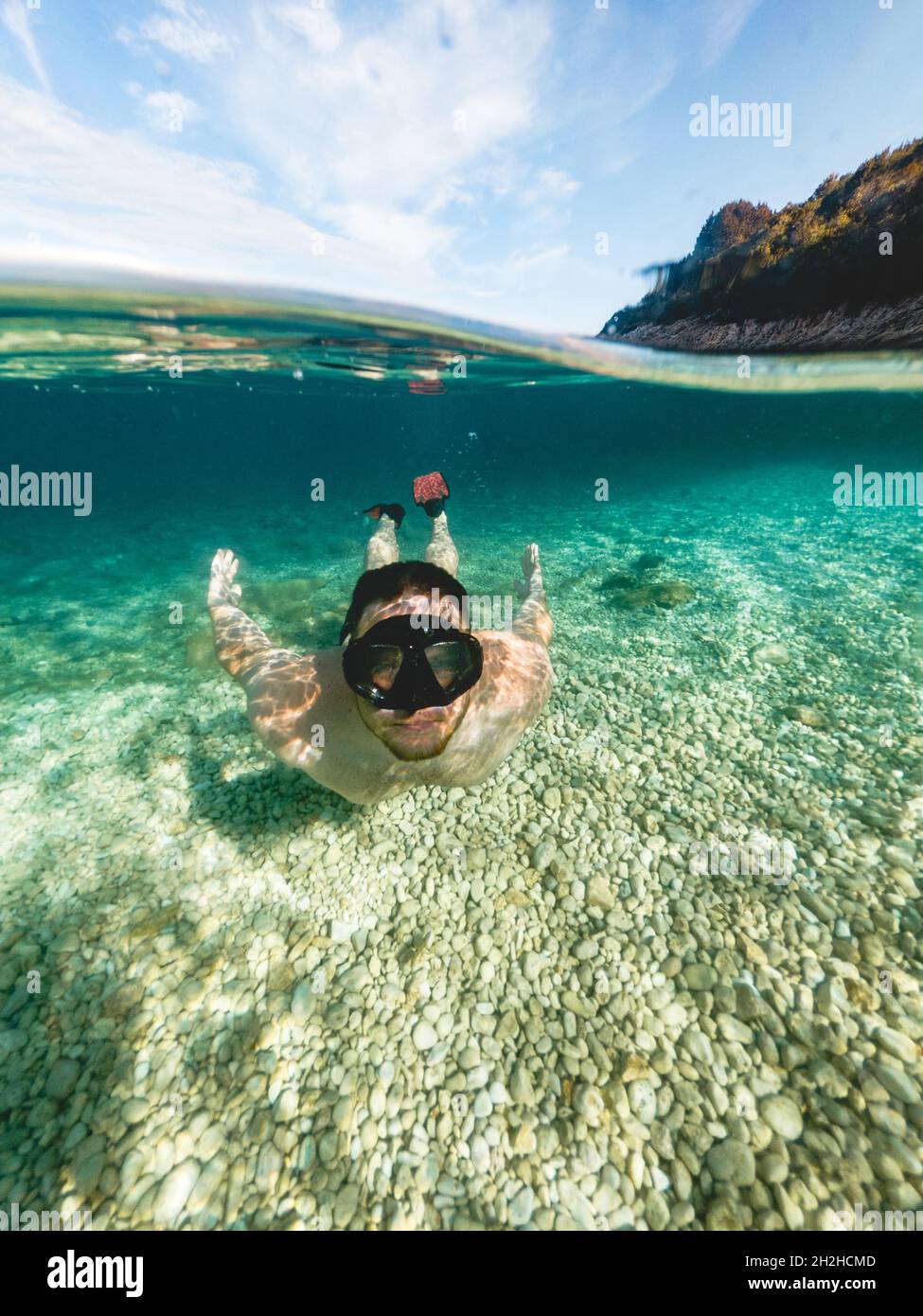man in diving mask snorkeling in sea water greece vacation Stock Photo ...