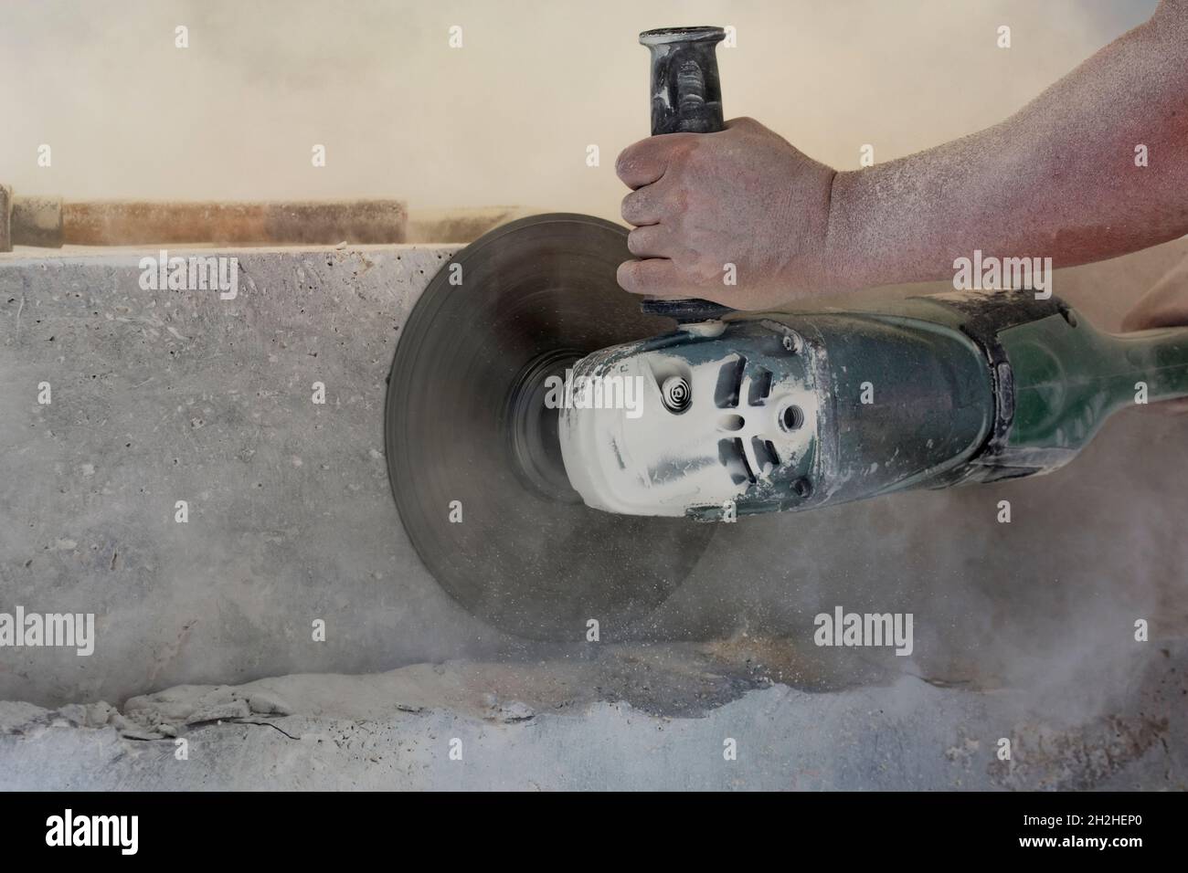 sculptor is cutting marble with cutting tool in his hand Stock Photo ...