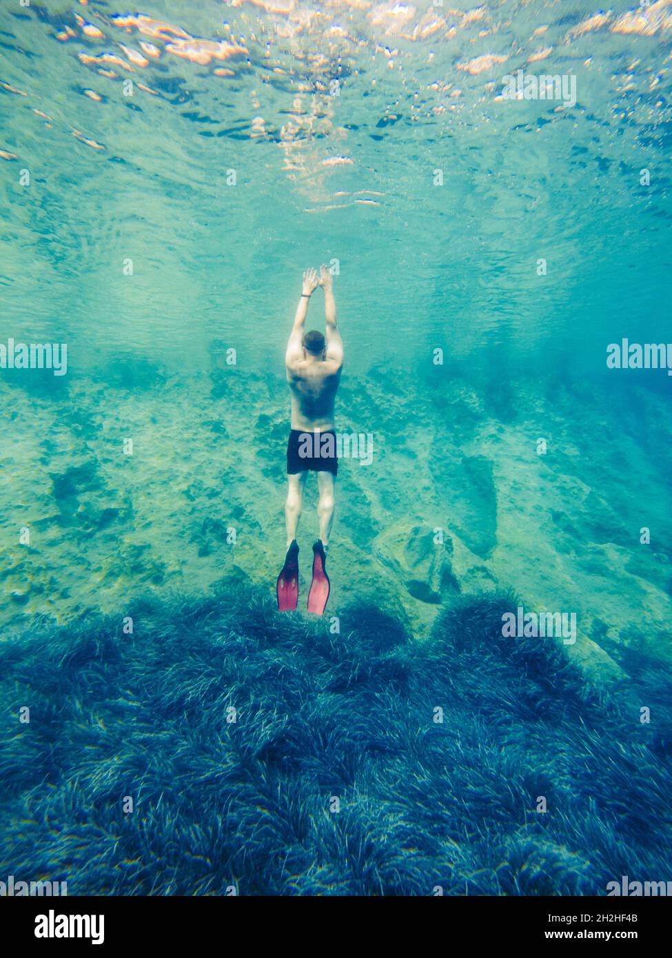 man in diving mask snorkeling in sea water greece vacation Stock Photo ...