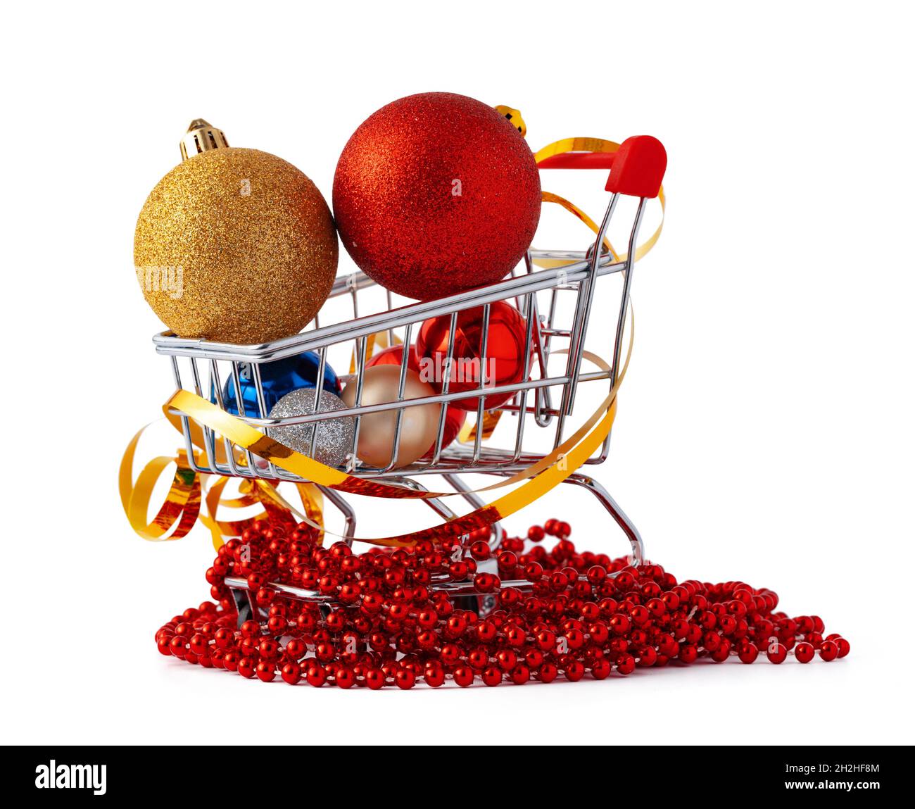 Shopping cart with Christmas decorations isolated on white background ...