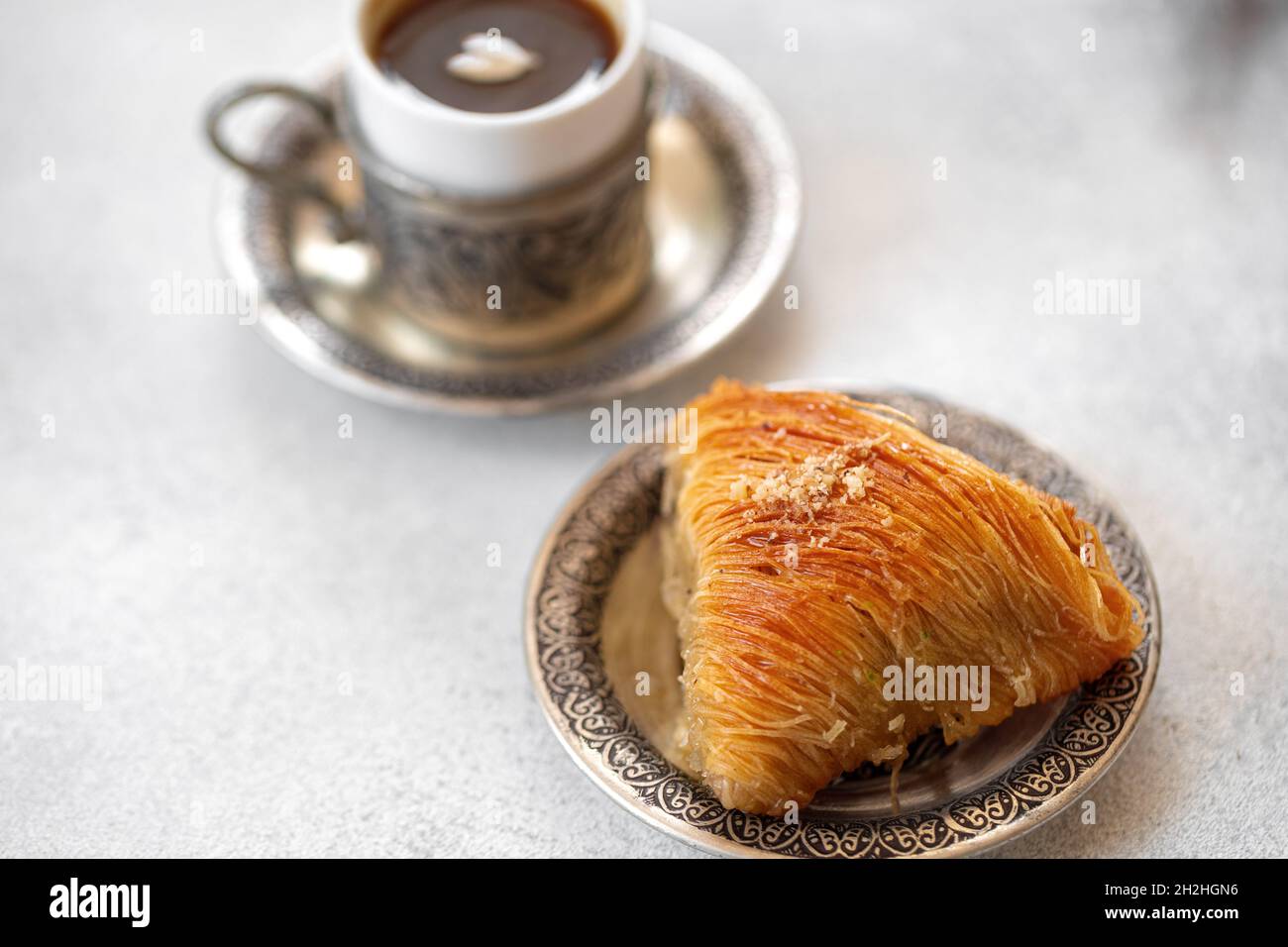 Small cup of Turkish coffee and Turkish baklava Stock Photo - Alamy