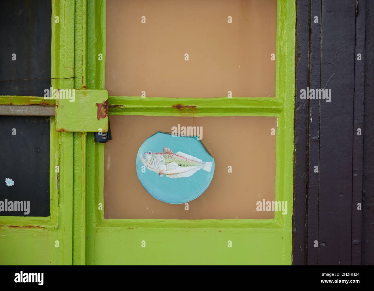 Fish figure depicted on window pane Stock Photo - Alamy