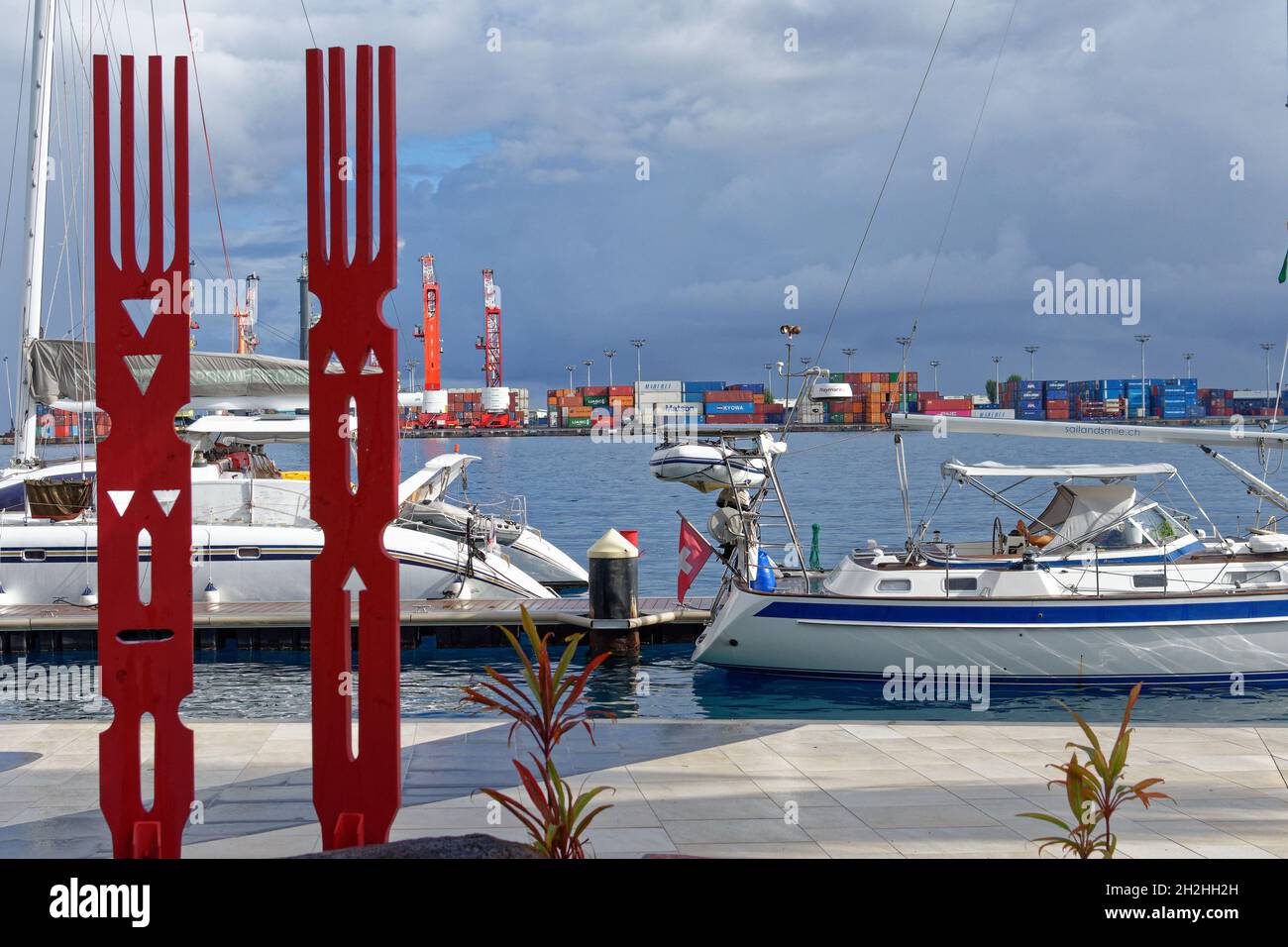 Tahiti, French Polynesia: sailboats alongside the quay and overview of ...