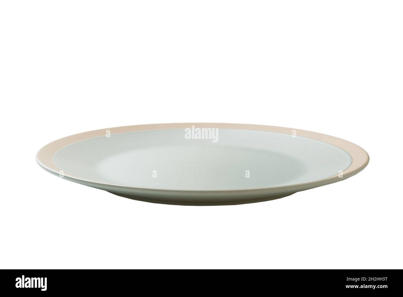 Blue ceramic round plate isolated over white background. perspective ...