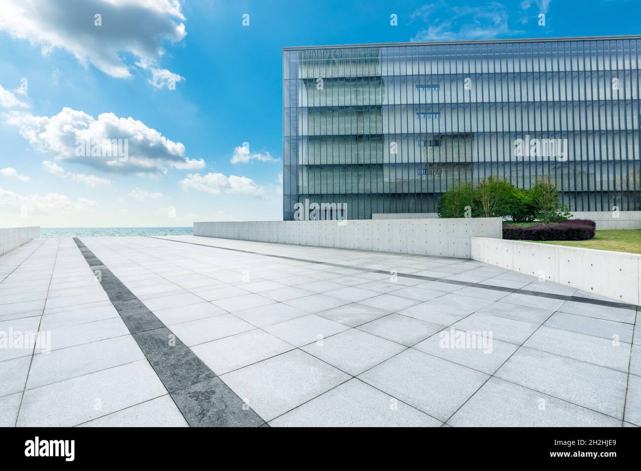 Empty square floor and urban commercial buildings with blue sky Stock ...