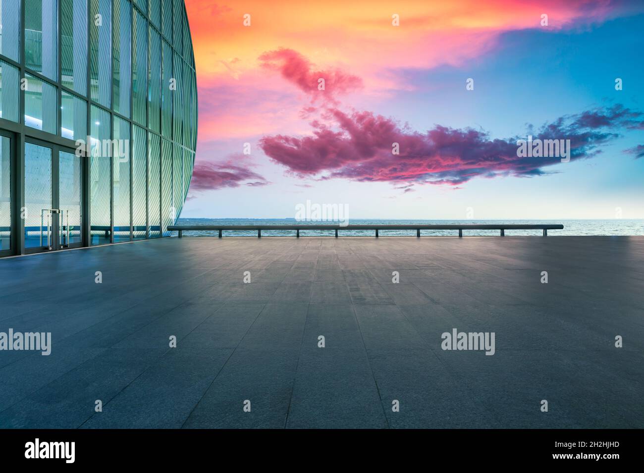 Empty square floor and lake with beautiful clouds at sunset Stock Photo ...