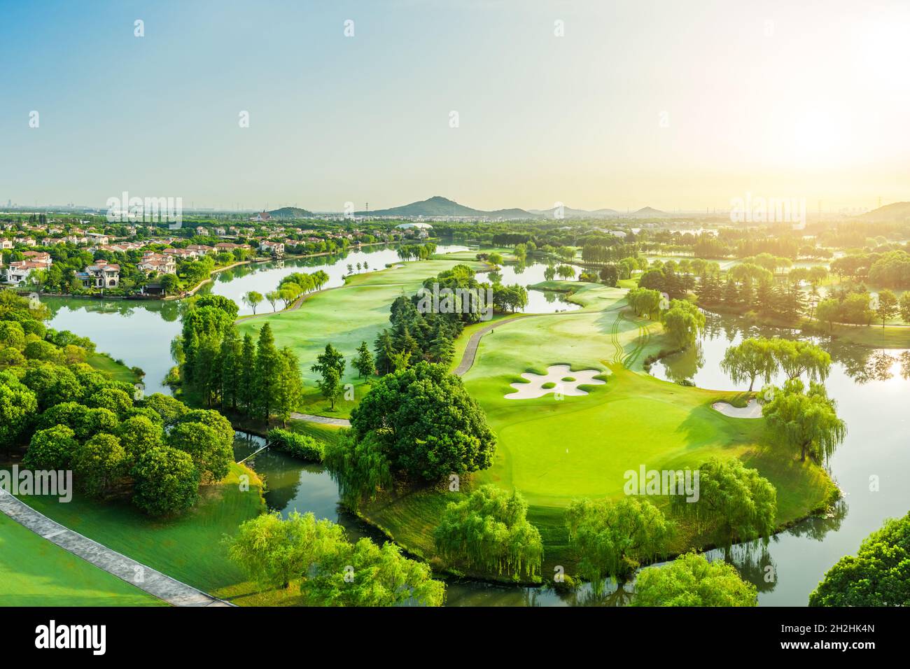 Aerial view of green grass and tree on golf course Stock Photo - Alamy