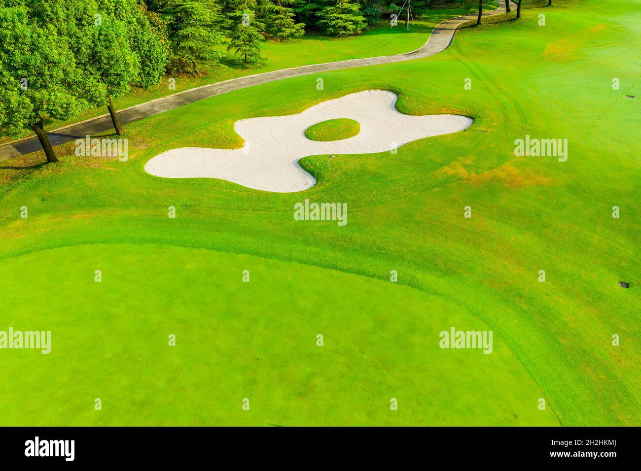 Aerial view of green grass and sand trap on golf course Stock Photo - Alamy