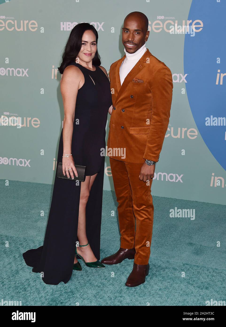 LOS ANGELES, CA - OCTOBER 21: Leonard Robinson (R) and Roxana Ortega ...