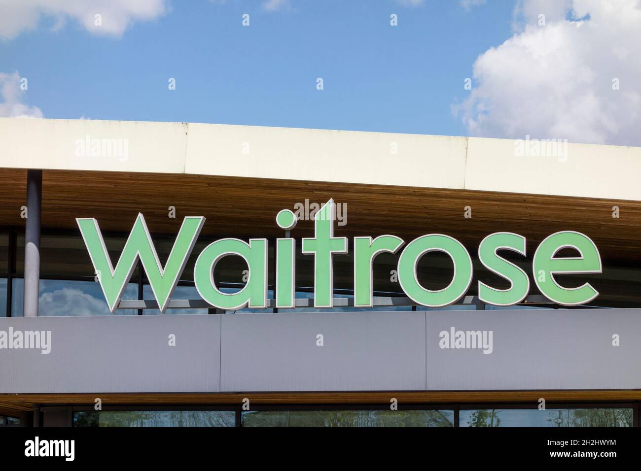 Waitrose logo displayed at supermarket, Gloucestershire, UK Stock Photo ...