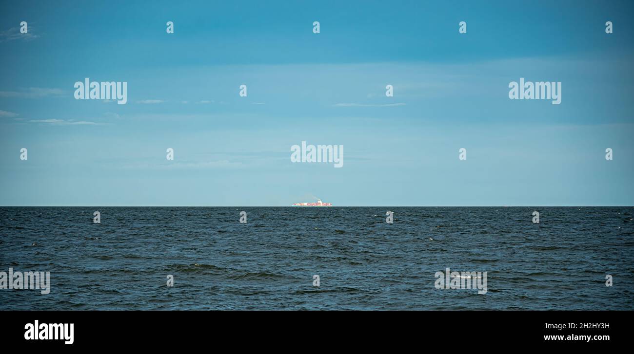 Container ship making way to port Stock Photo - Alamy