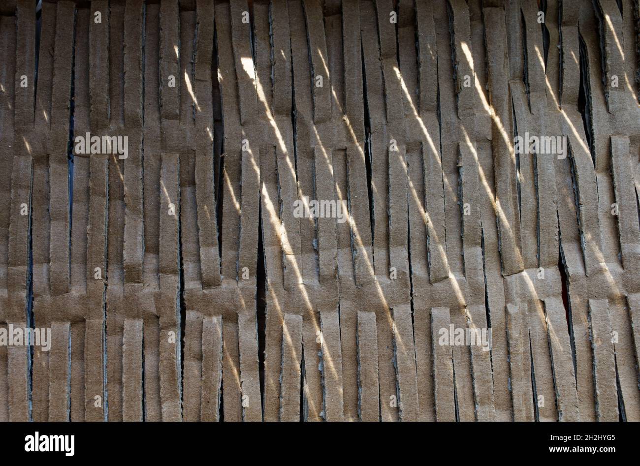 Cut cardboard with natural light and shadow effects Stock Photo - Alamy