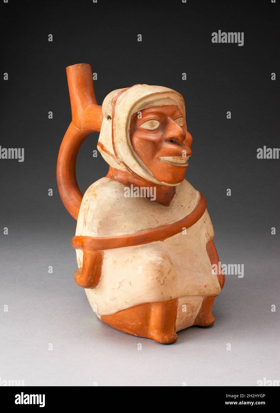 Handle Spout Vessel in the Form of a Seated Man Carrying a Bag, 100 B.C ...