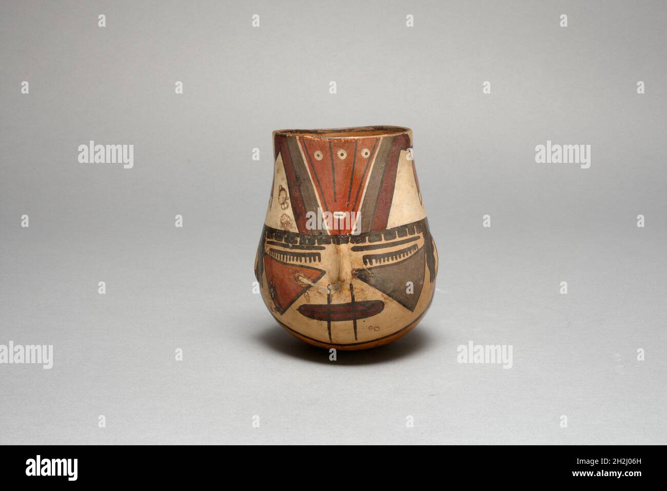 Beaker in the Form of a Trophy Head with Bound Lips, 180 B.C./A.D. 500 ...