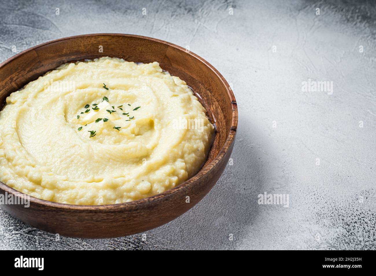 Boiled potato puree, Mashed potatoes in a wooden plate. White ...