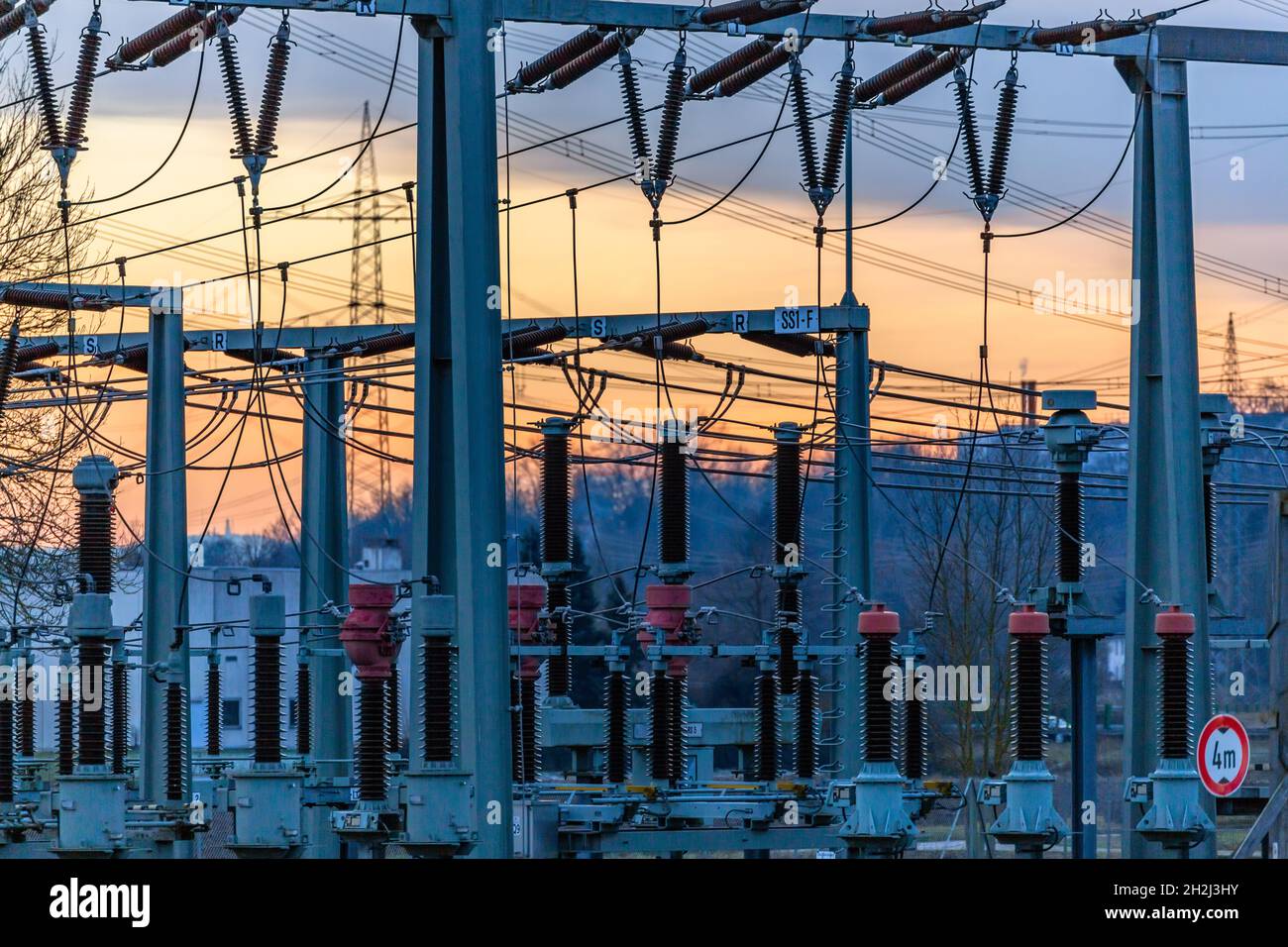 Distribution electric substation with power lines and transformers in ...