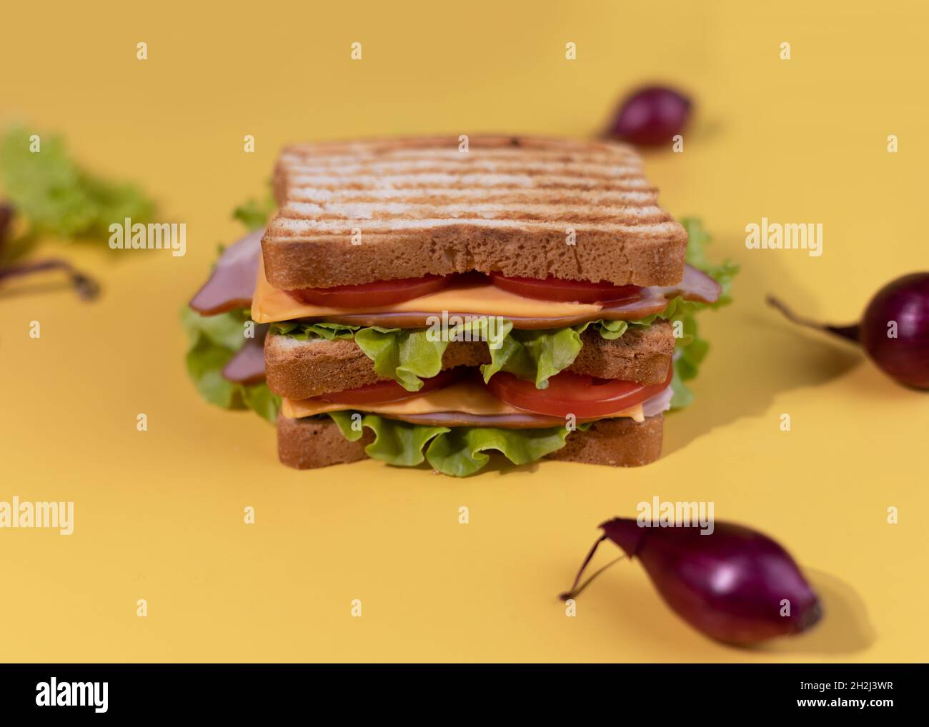 Traditional sandwich made from slices of toasted bread, cheese, ham ...