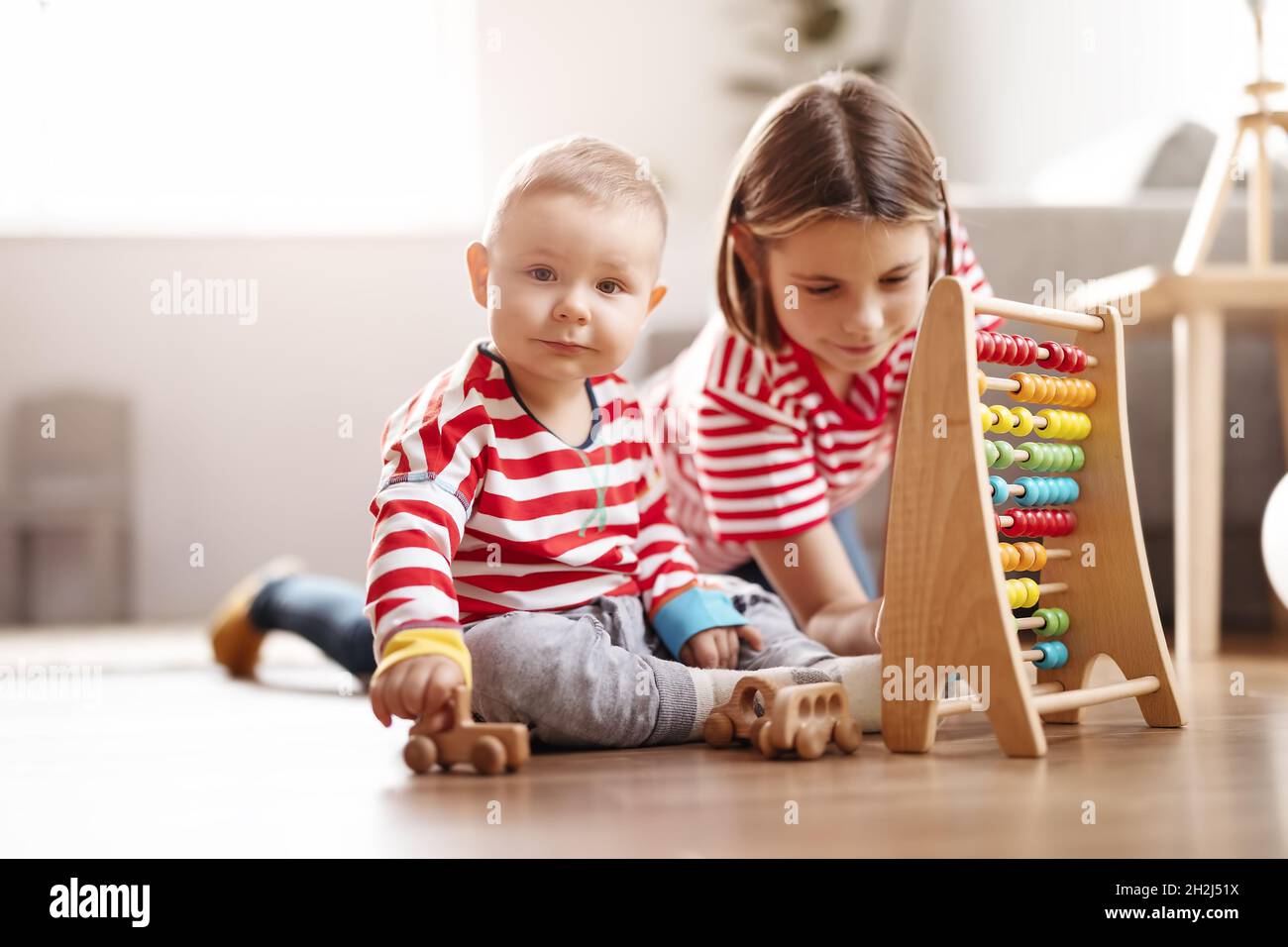 Brother sister sibling playing together hi-res stock photography and ...