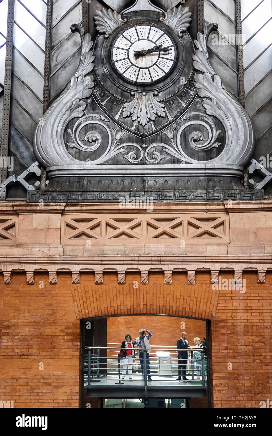 Spain, Madrid: old clock of Madrid Atocha train station. Reflection of ...