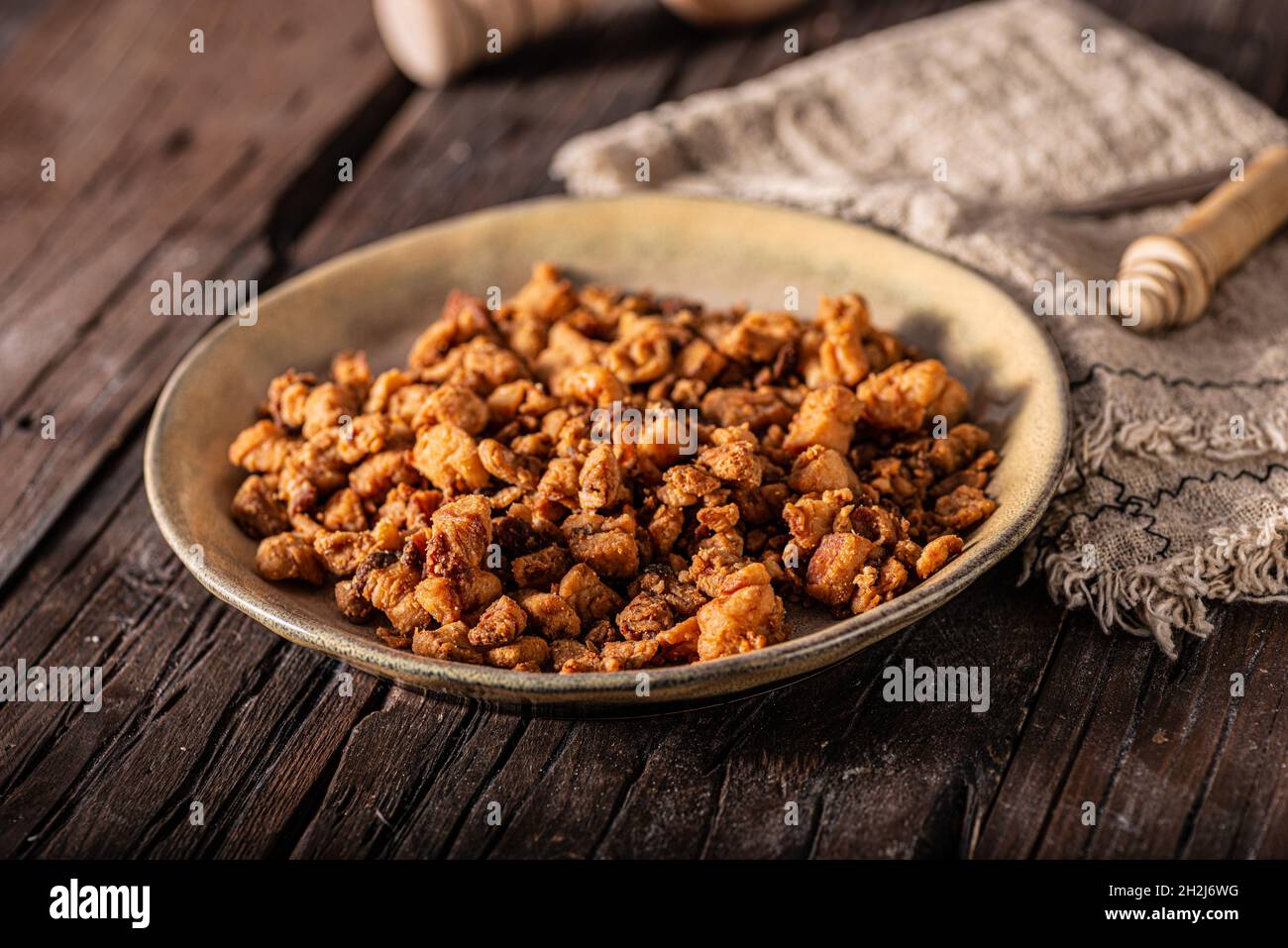 Delicous and simple pork greaves bio homemade Stock Photo - Alamy