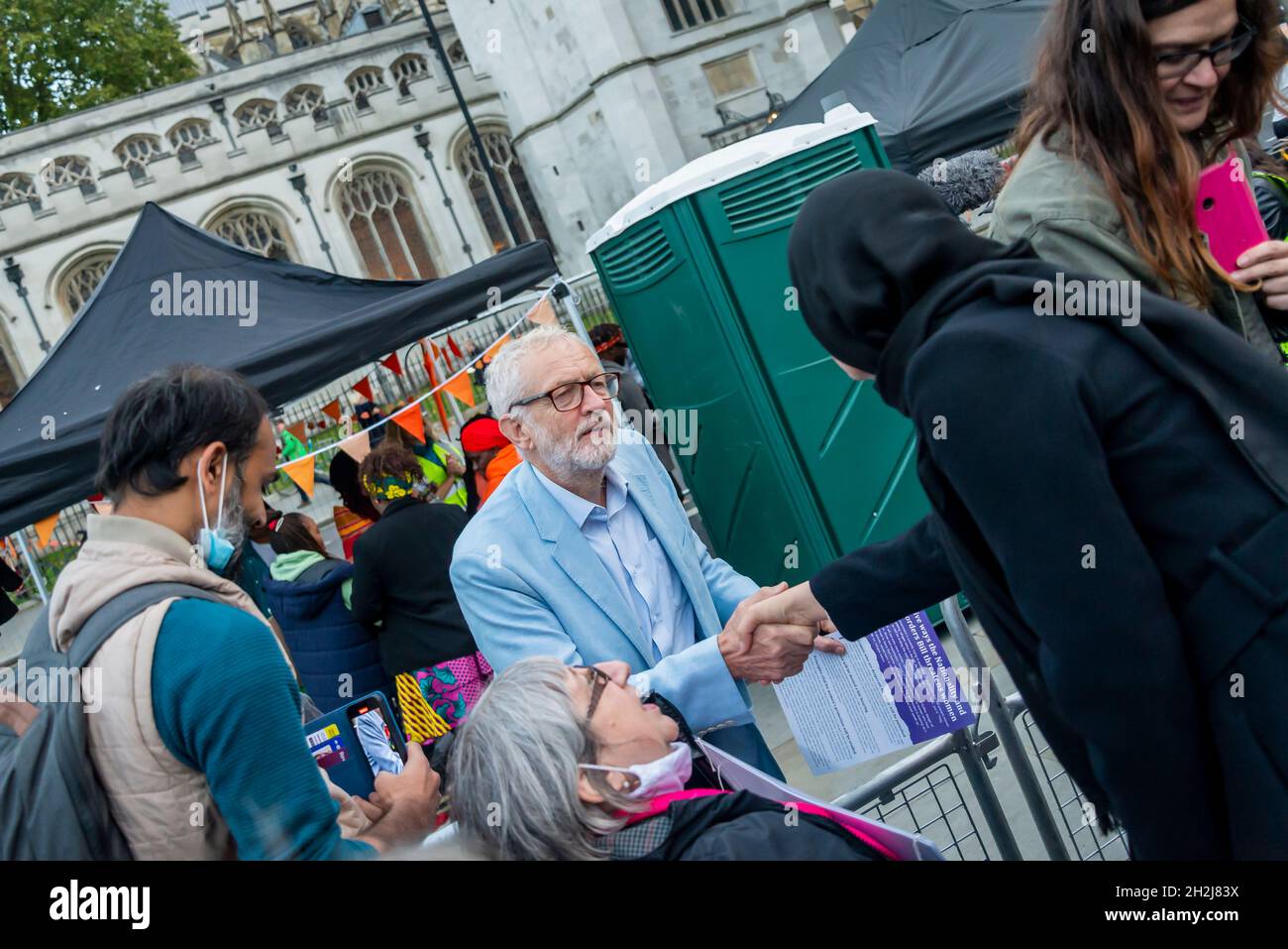 Jeremy Corbyn, former Labour leader, talking to a Muslim woman at the ...
