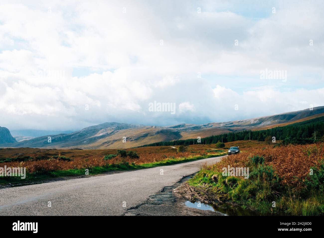 Scenic view of the NC500 road trip in scotland with mountains and lakes ...