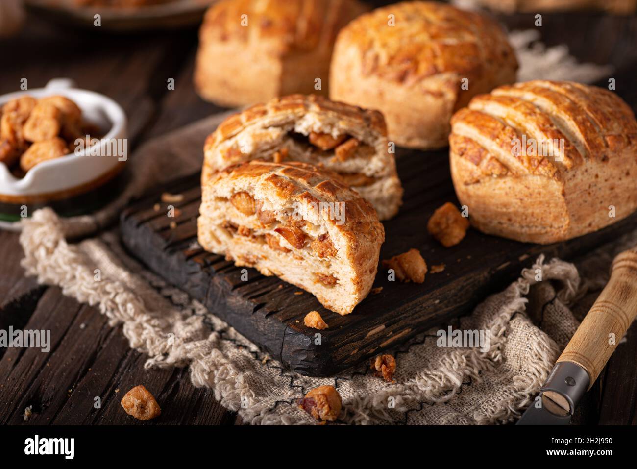 Delicious homeade bun filled with pork greaves and garlic Stock Photo ...
