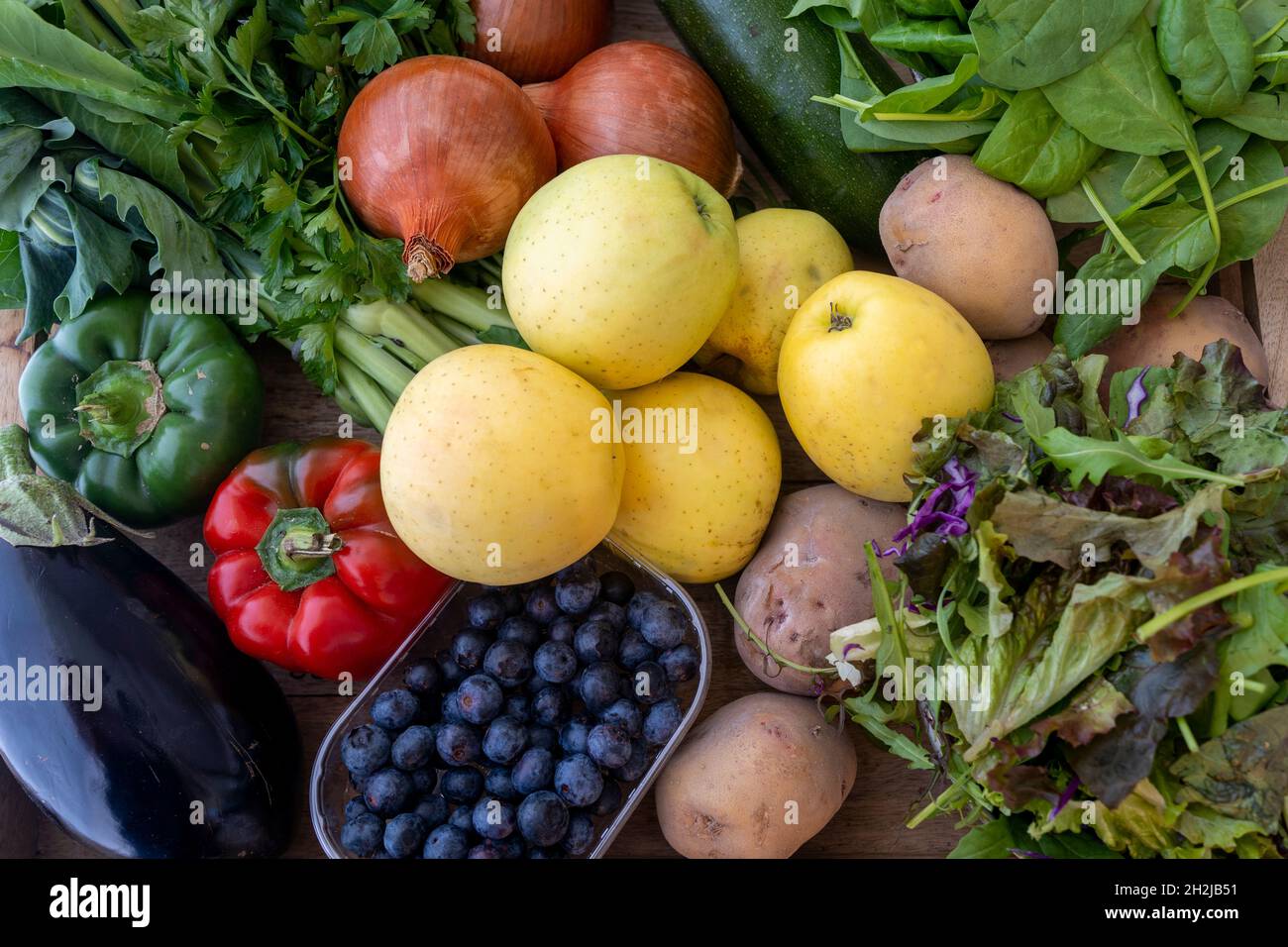 Bio vegetable and fruits in wooden basket harvested in the morning. Bio ...