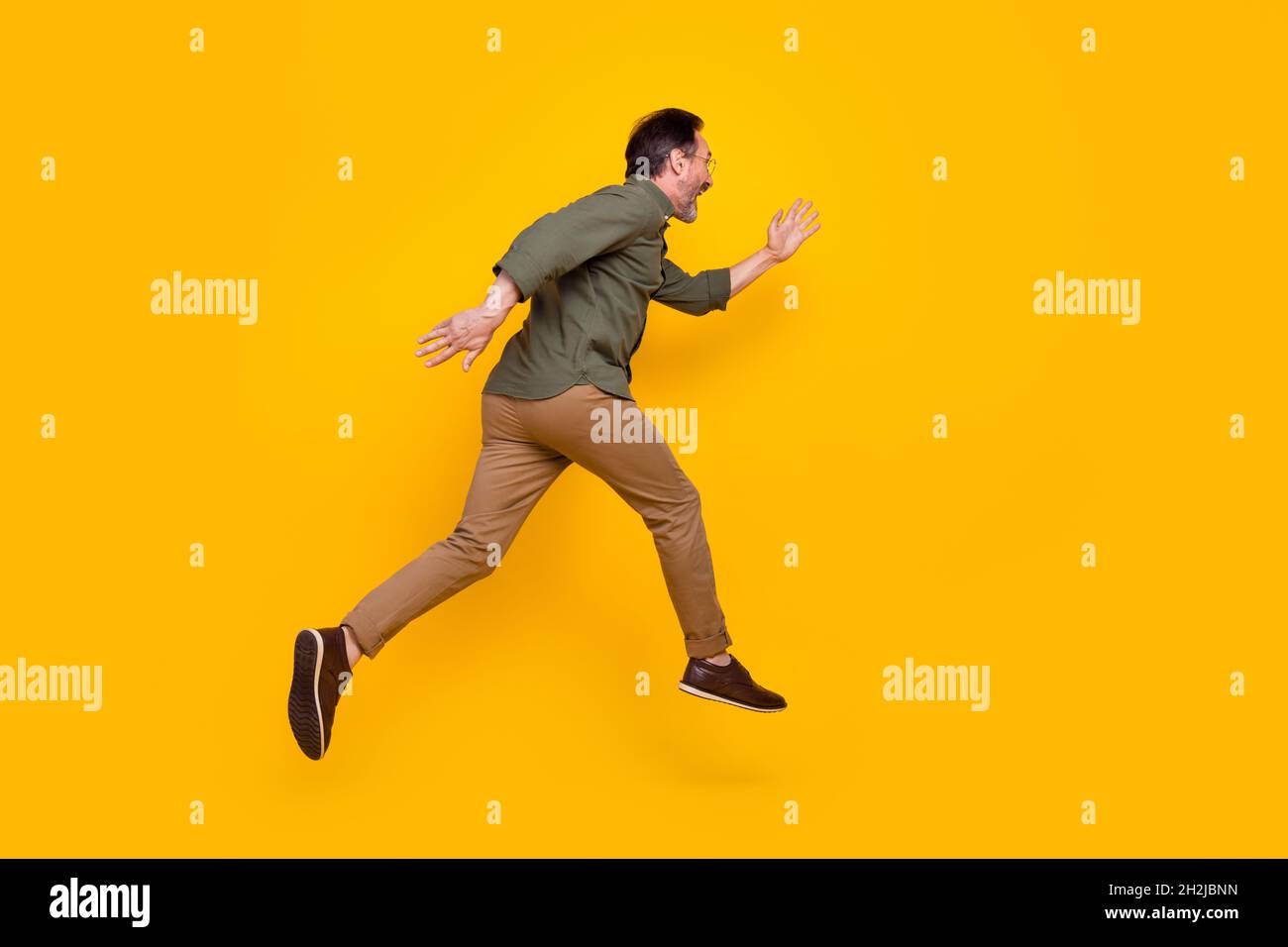 Full length body size profile side view of attractive cheerful man ...