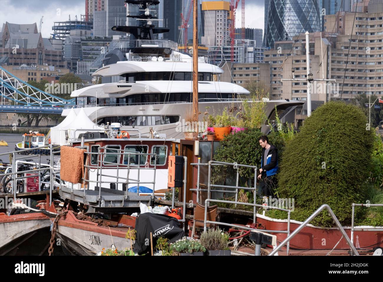 With heritage barges and 'lighters' in the foreground, the superyacht ...