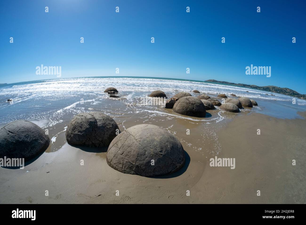 The Moeraki Boulders are unusually large and spherical boulders lying ...