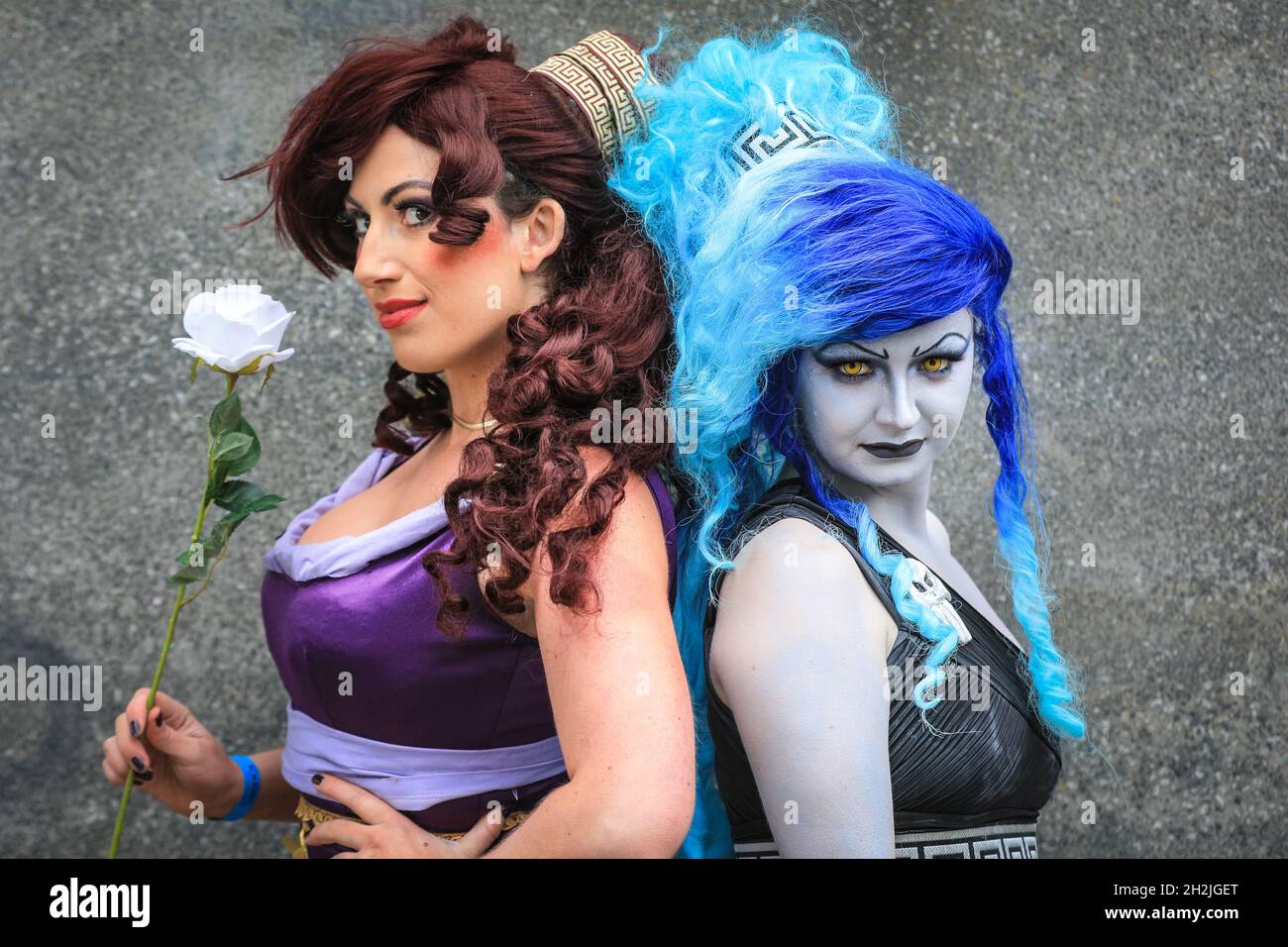 ExCel, London, UK. 22nd Oct, 2021. Two cosplayers as Megara and Hades ...