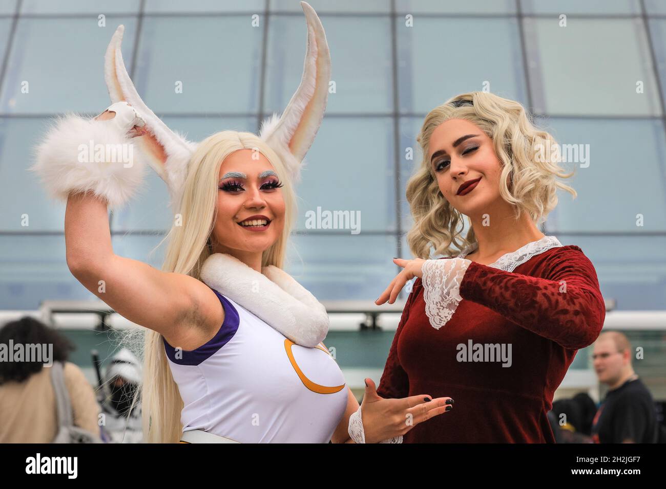 ExCel, London, UK. 22nd Oct, 2021. Two female cosplayers have fun ...