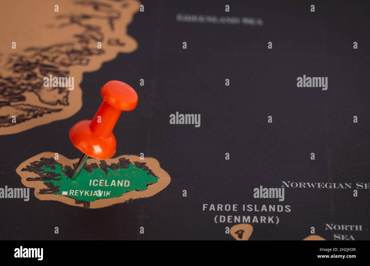 Location Iceland, push pin on map close-up, marker of destination for ...