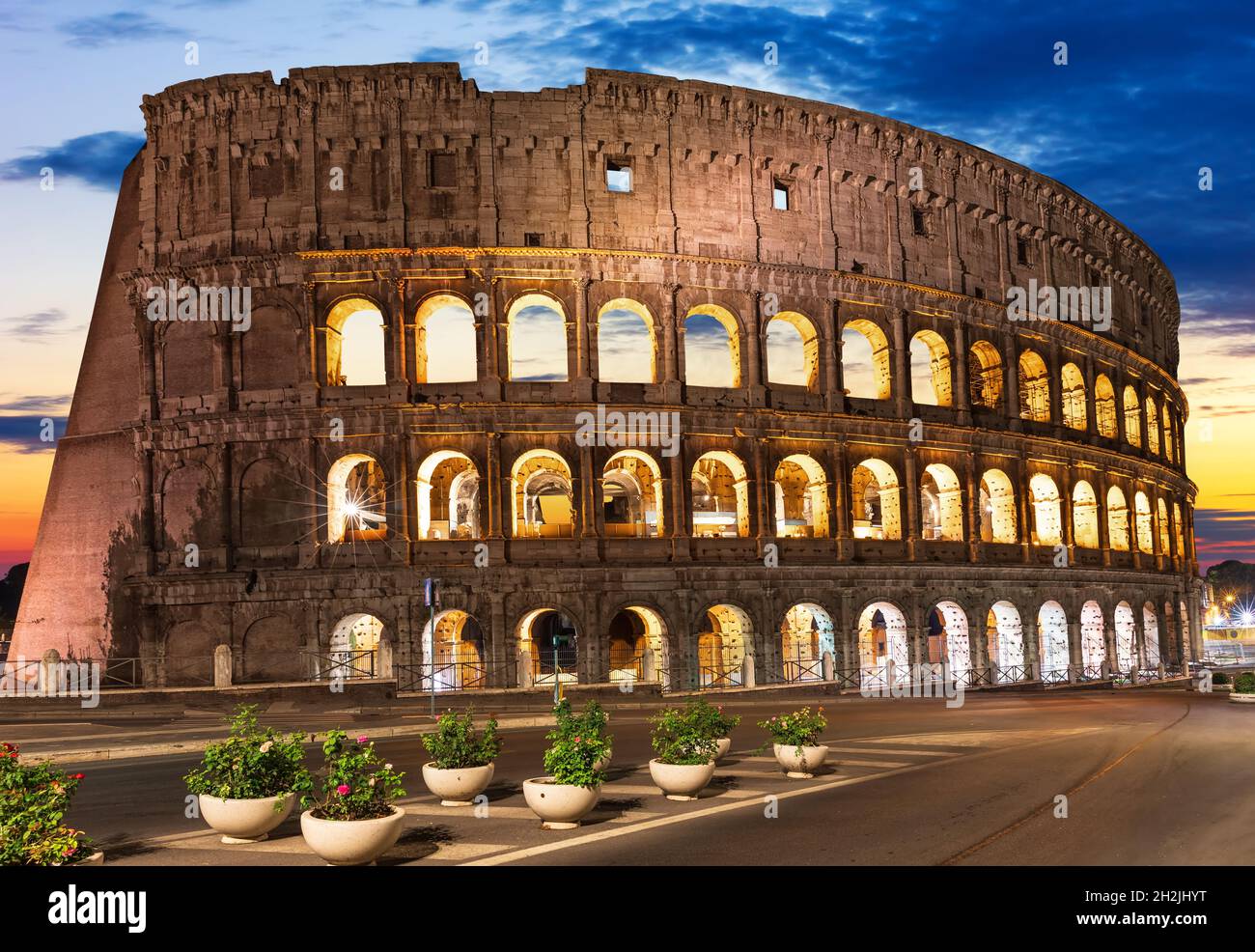 Roman Colosseum illuminated at sunset, Romw, Italy Stock Photo - Alamy