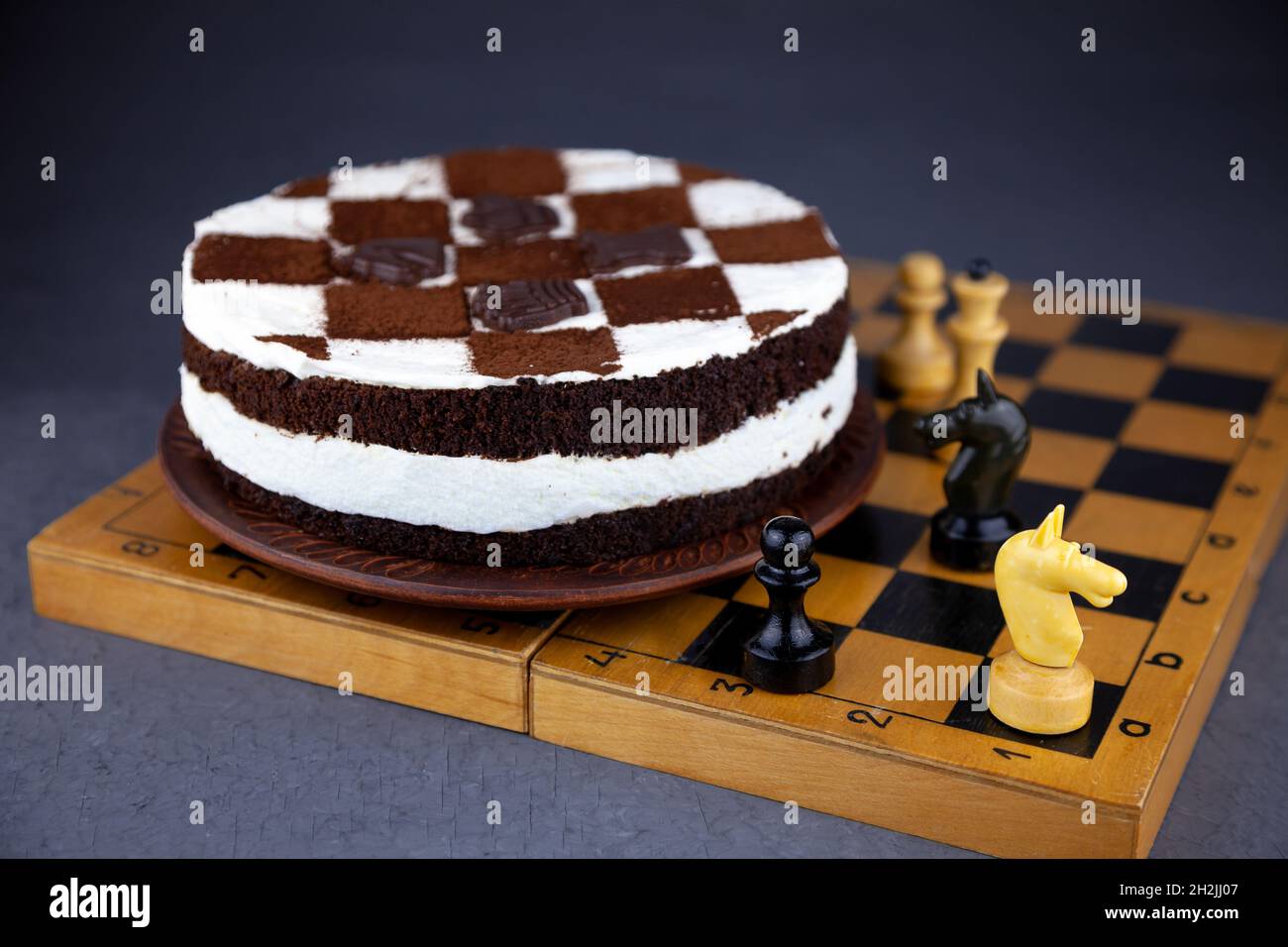 Sponge cake with butter cream. Cake in the form of a chessboard. A gift ...