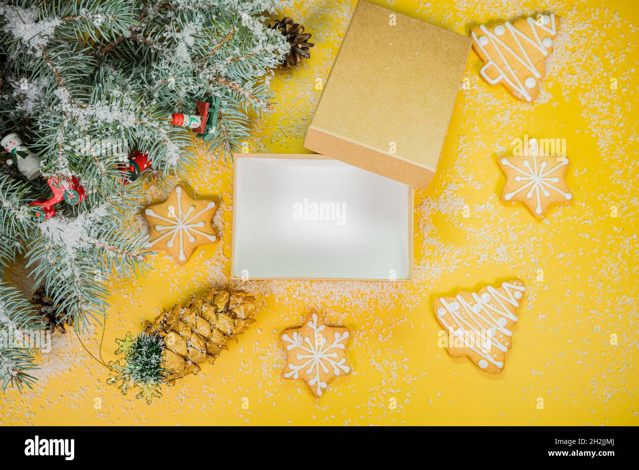 Christmas yellow background with gift boxes Stock Photo - Alamy