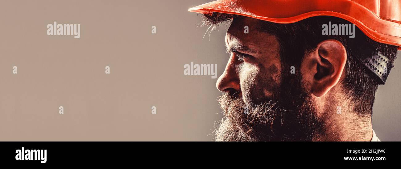 Building, industry, technology - builder concept. Bearded man worker ...