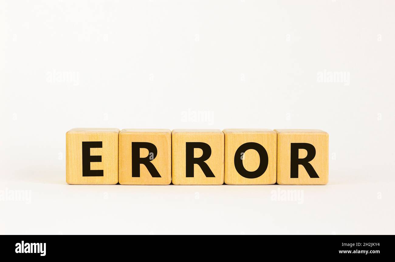 Error symbol. The concept word 'error' on wooden cubes on a beautiful ...