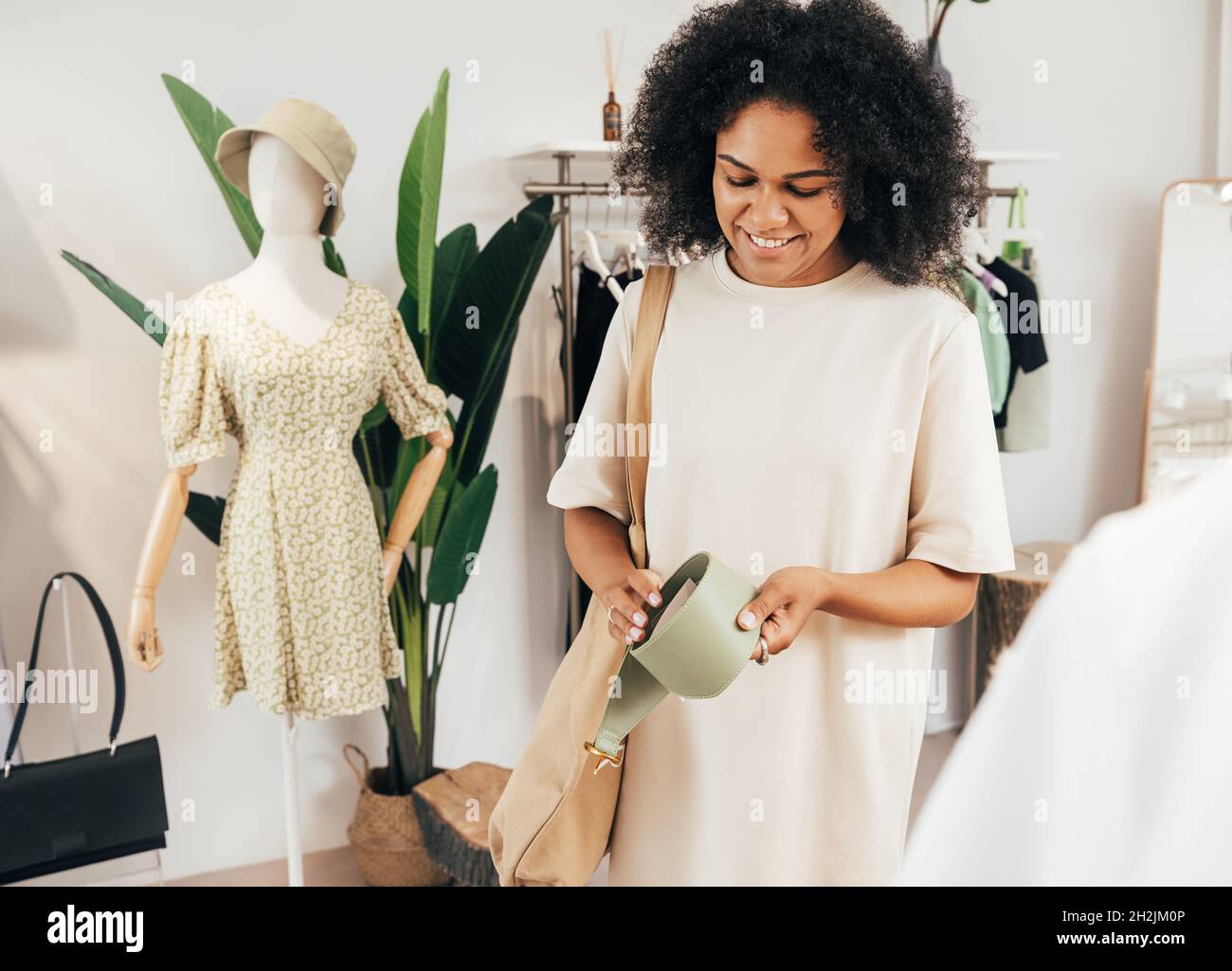 One woman holding belt hi-res stock photography and images - Alamy