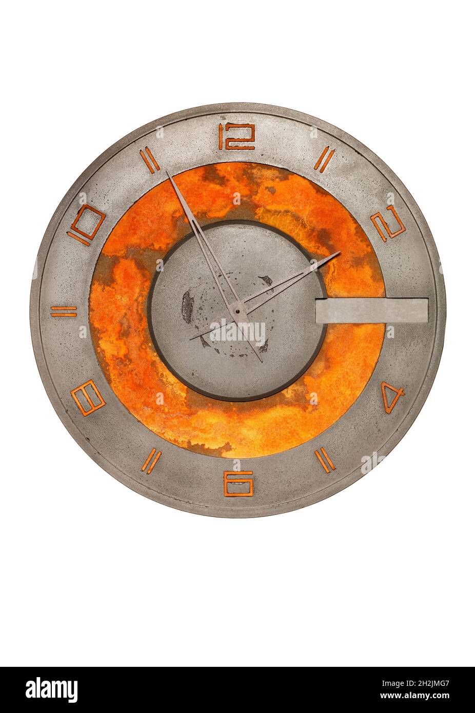 Round industrial wall clock made of metal with a halo of rust in a ...