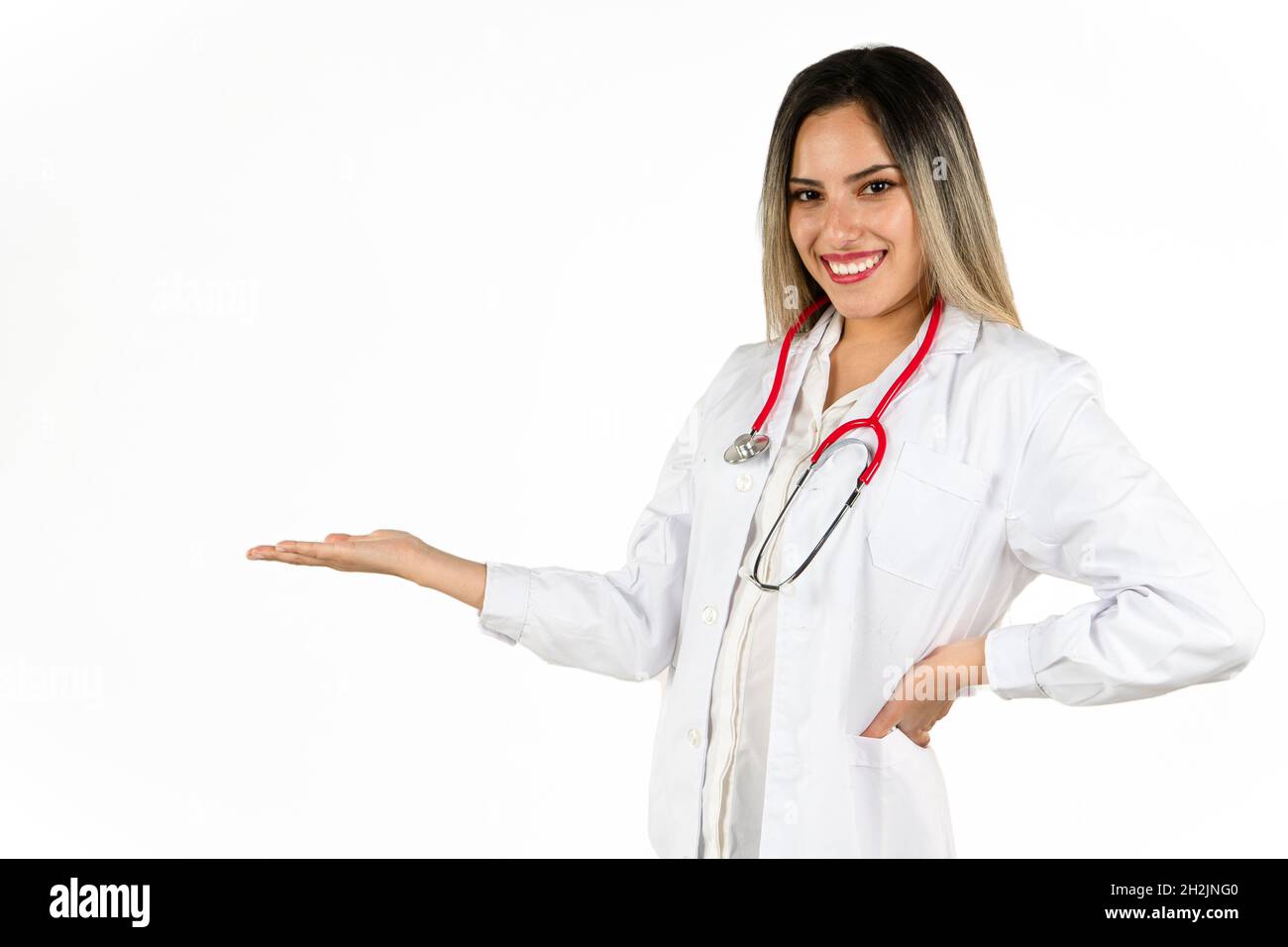 Attractive Young Doctor with her extended right hand control pretending ...